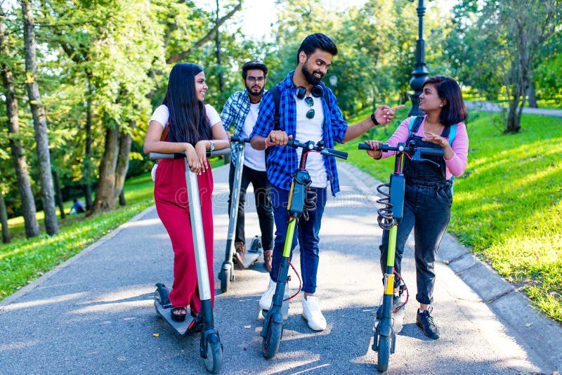 Modern Indian Friends Ride on Segway in Park in India Stock Photo ...