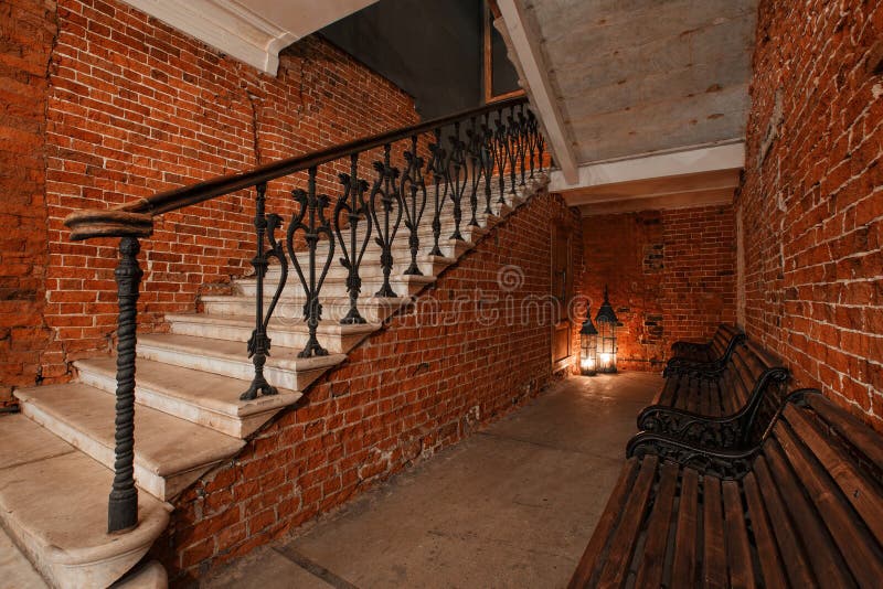 Modern Industrial Creative Workspace. Staircase with Textured Brick ...