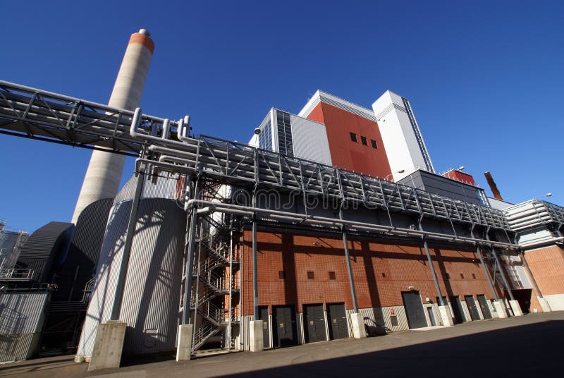 Modern Industrial Factory Against Blue Sky Stock Photo - Image of plant ...
