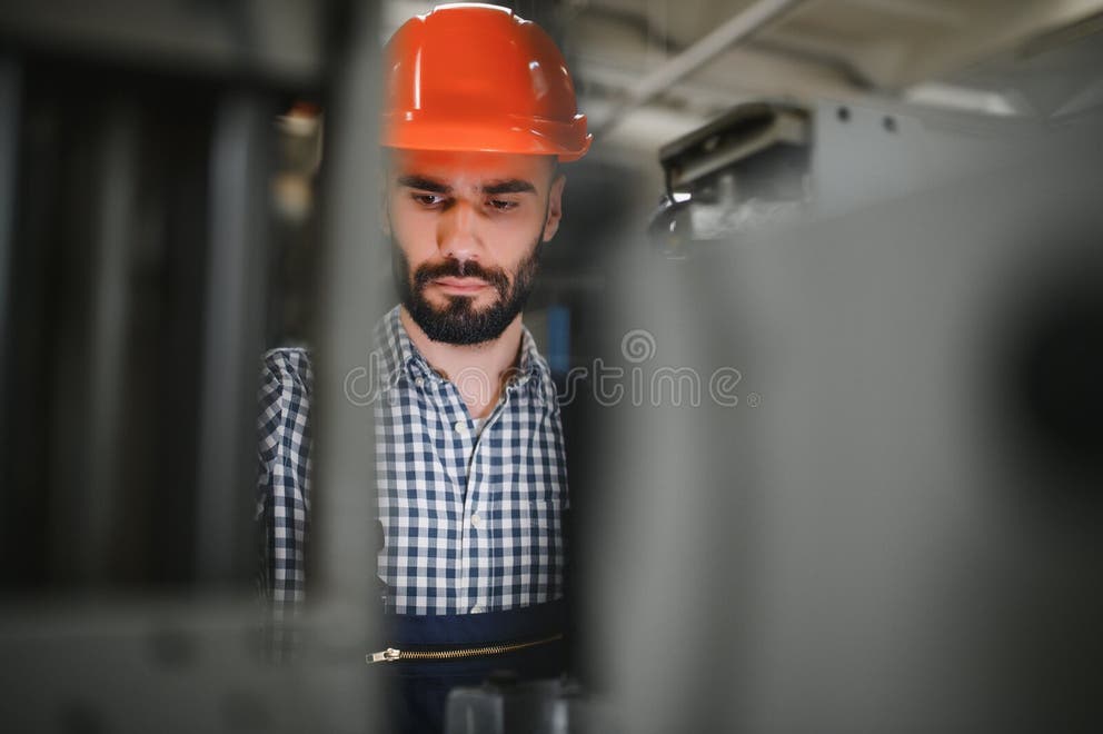 Modern Industrial Machine Operator Working in Factory Stock Image ...