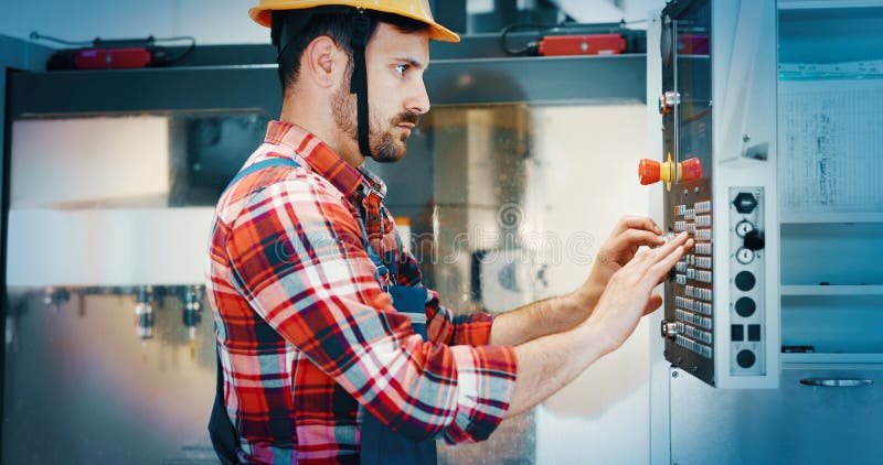 Modern Industrial Machine Operator Working in Factory Stock Image ...