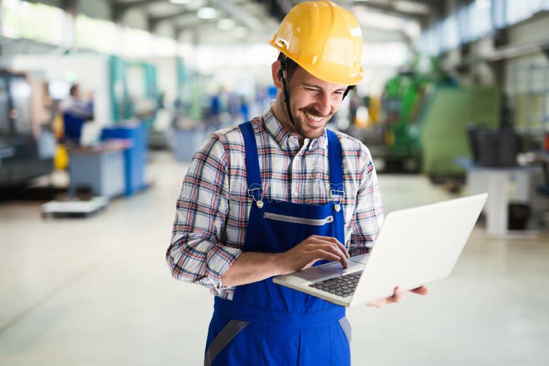 Modern Industrial Machine Operator Working in Factory Stock Image ...