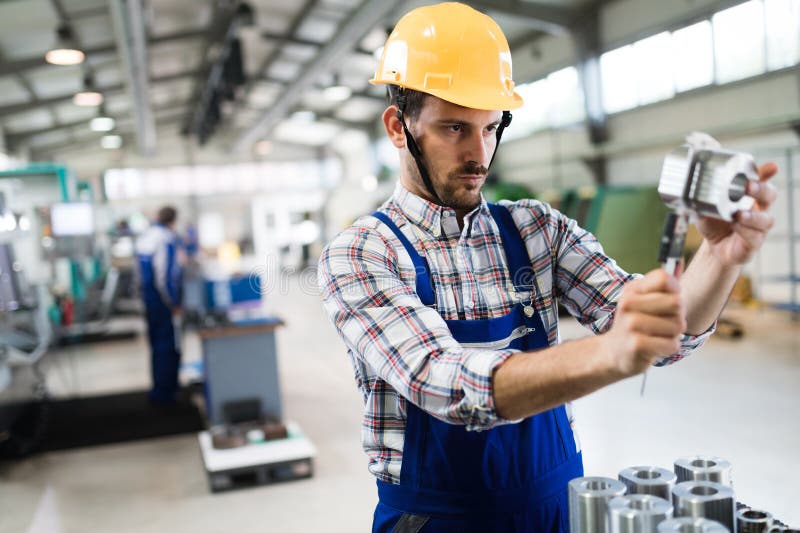 Modern Industrial Machine Operator Working in Factory Stock Image ...