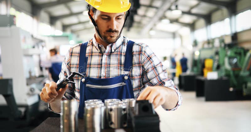 Modern Industrial Machine Operator Working in Factory Stock Photo ...