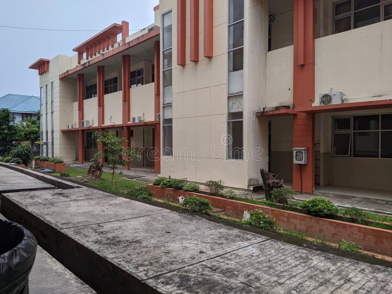 Modern Institutional Building Exterior with Courtyard Garden and ...