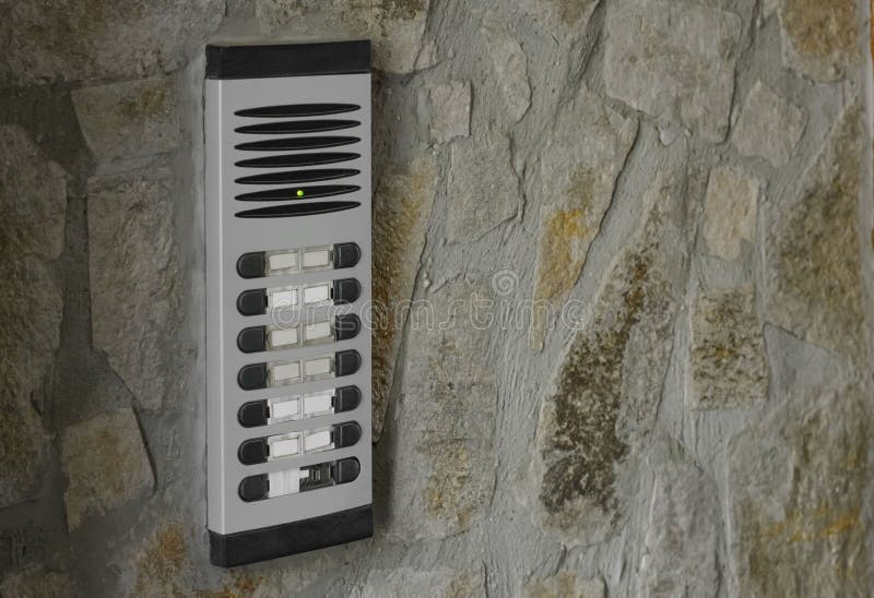 Modern Intercom on Concrete Wall with Stone Fragments, Space for Text ...