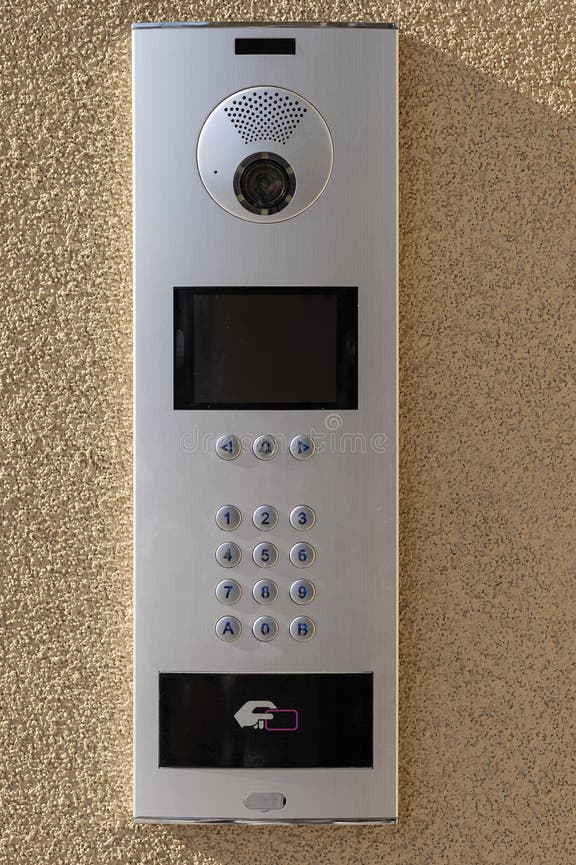 Modern Intercom System with Camera, Keypad, and Contactless Card Reader Installed on Textured ...