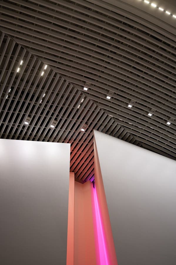 Modern Interior of a Building Featuring a White Ceiling with Recessed ...