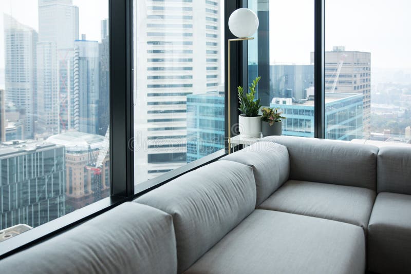 Modern Interior Design with a Sofa Against Panoramic Windows Stock ...