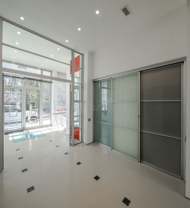 Modern Interior of Hall in Luxury Private House. Glass Sliding Doors ...