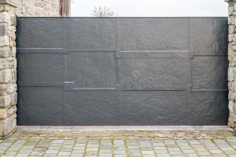 Solid Metal Sliding Gate in a Rustic Style Stock Photo - Image of ...