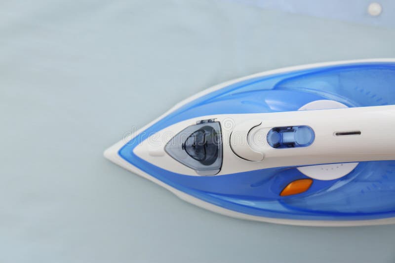 Modern Iron on Light Fabric,. Laundry Day Stock Photo - Image of color ...