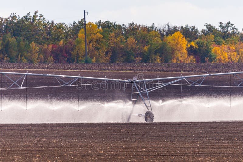 Modern Irrigation System Watering a Farm Field Stock Photo - Image of ...