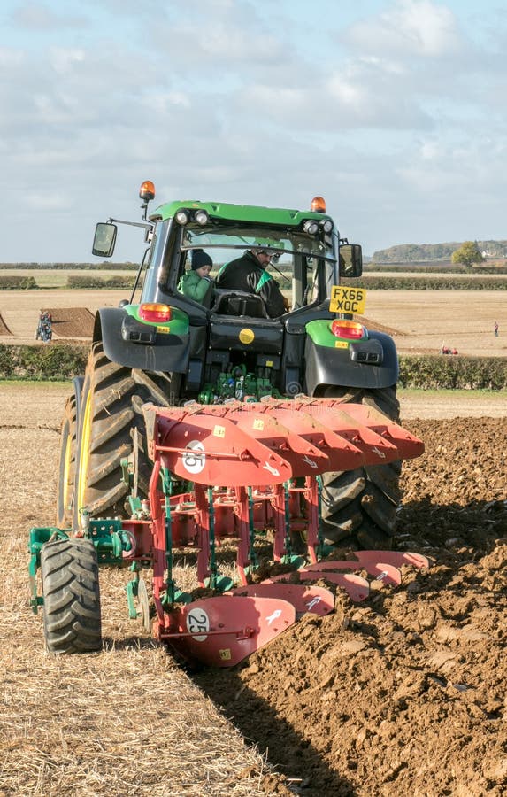 Modern John Deere Tractor Pulling a Plough Editorial Image - Image of ...