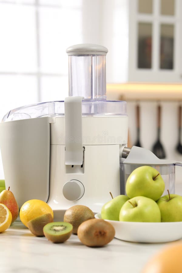 Modern Juicer and Fruits on White Marble Table in Kitchen Stock Image ...