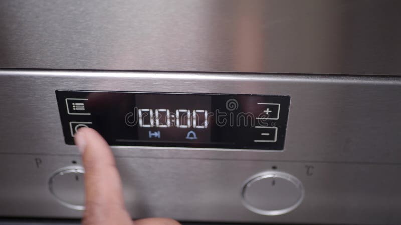 The Modern Kitchen Appliance Features a Digital Timer Display for ...