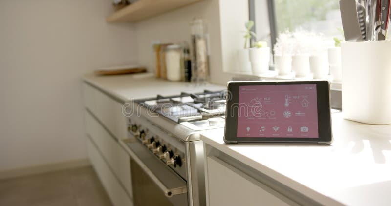 A Modern Kitchen Boasts a Smart Home Interface on the Counter, Copy ...