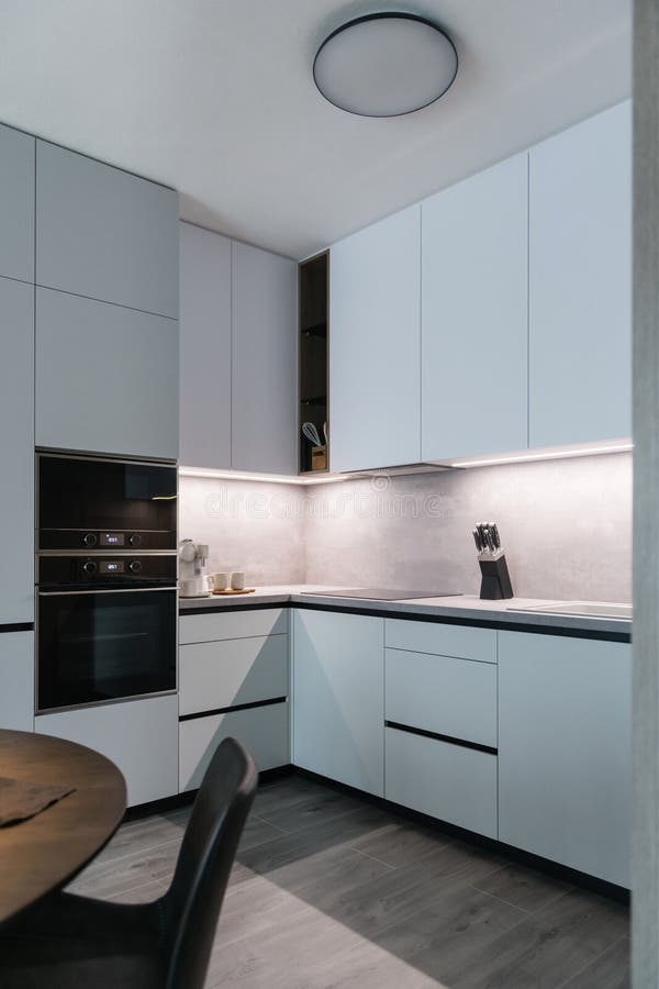 Modern Kitchen with Built in Appliances Stock Photo - Image of floor ...