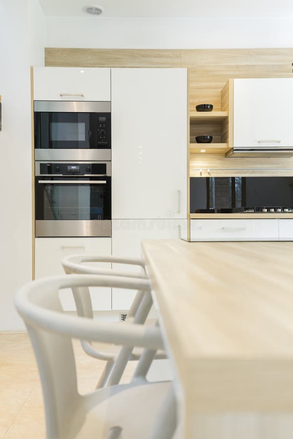 Modern Kitchen with Built-in Oven Stock Image - Image of wood, cabinets ...