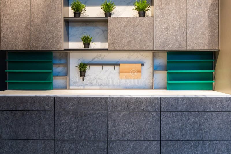 Modern Kitchen Cabinet with Marble Backsplash and Shelves Stock Image ...