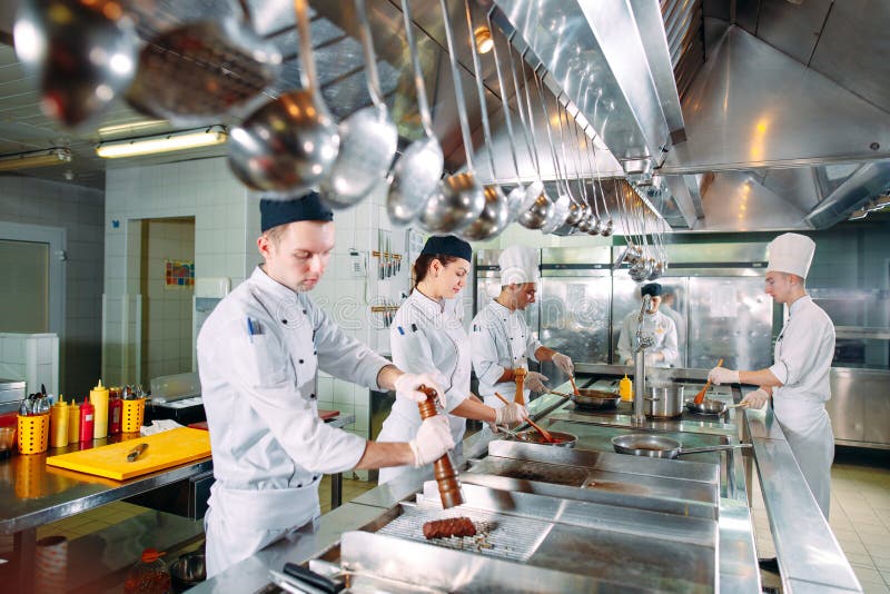 Modern Kitchen. the Chefs Prepare Meals in the Restaurant`s Kitchen ...