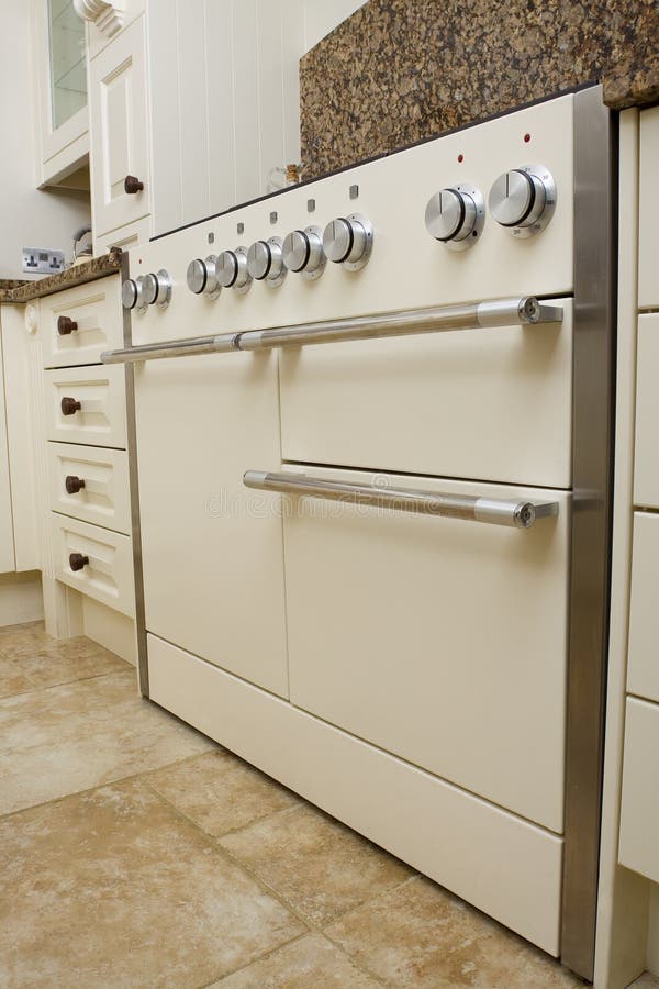 Modern kitchen cooker stock photo. Image of designer, cream - 9927000