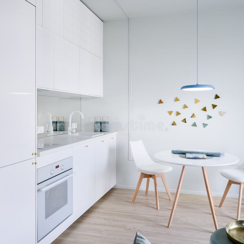 Modern Kitchen and Dining Area Stock Image - Image of area, lamp: 151609621