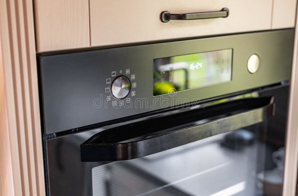 Modern Kitchen Has an Oven and the Control Panel, Oven Control Panel ...