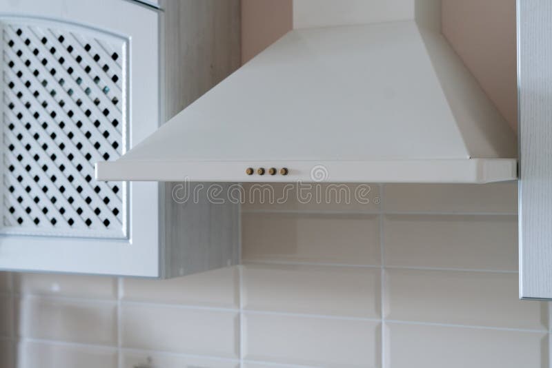 A Modern Kitchen Interior Design, Range Hood Over the Cooking Oven ...