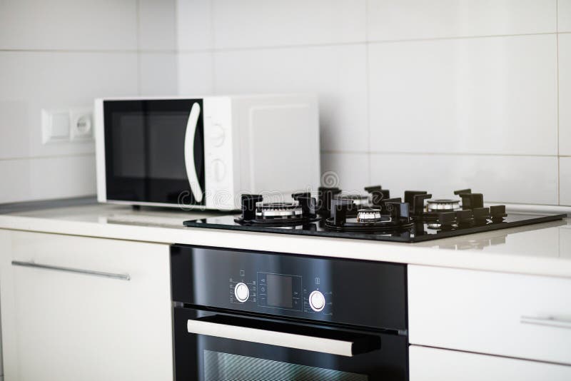 Modern Kitchen Interior with Electric and Microwave Oven. Stock Photo ...