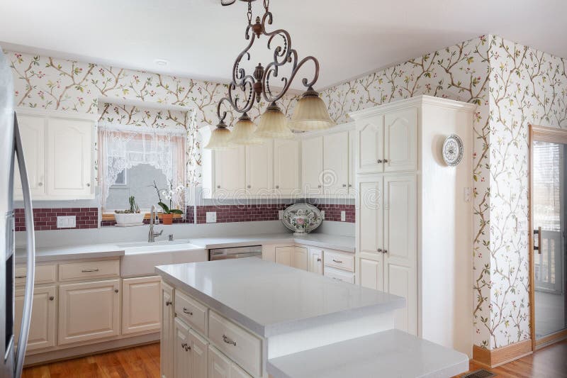 Modern Kitchen Interior Featuring a White Countertop in the Center ...