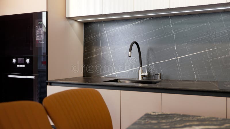 Modern Kitchen Interior in a Furniture Showroom. Elegant Modern Kitchen ...