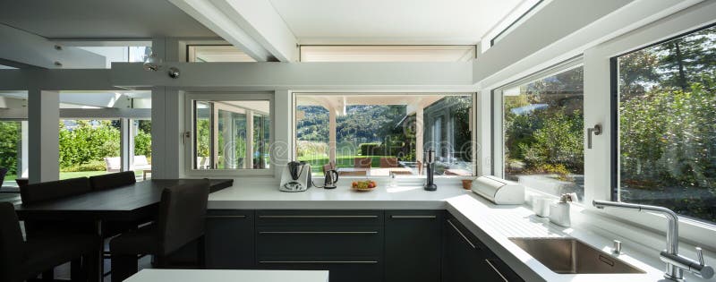 Modern kitchen with view stock image. Image of inside - 93473641