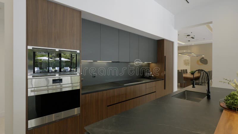 Modern Kitchen Interior with Luxury Cabinets and Table Top with View of ...