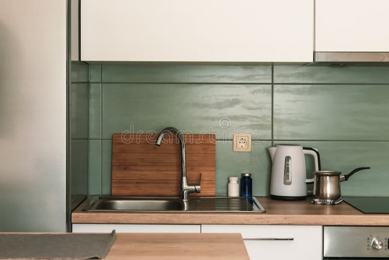 Modern kitchen interior stock image. Image of water - 198330737