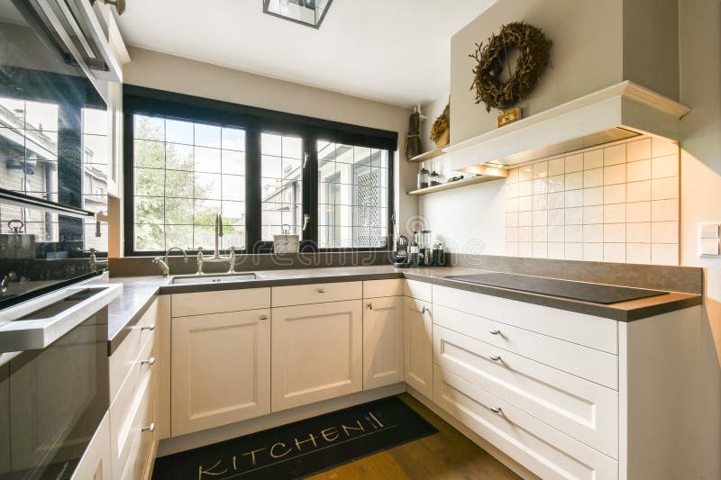 Modern Kitchen with Natural Light Stock Photo - Image of home, wood ...