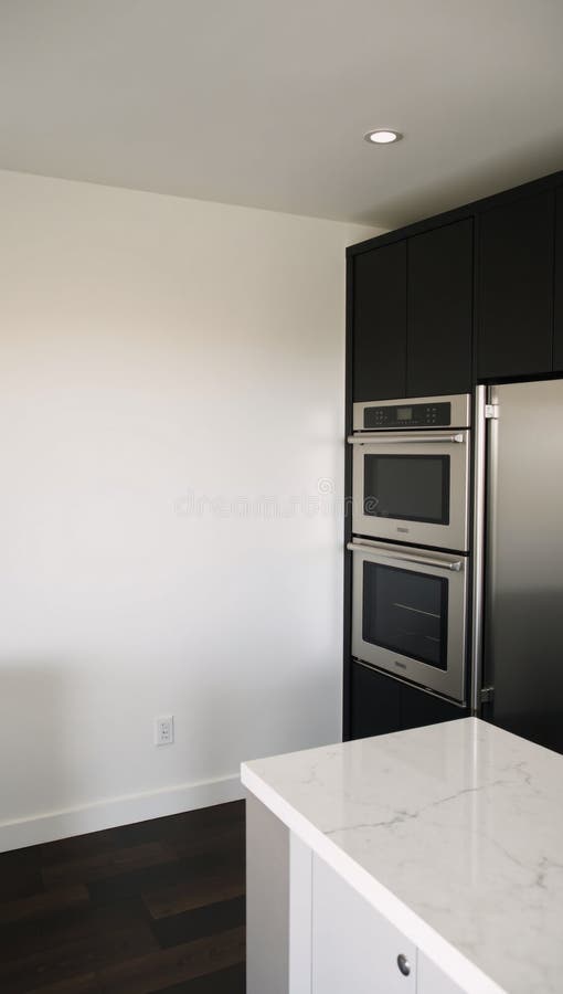 Modern Kitchen Scene Featuring an Empty White Wall on the Left Side ...