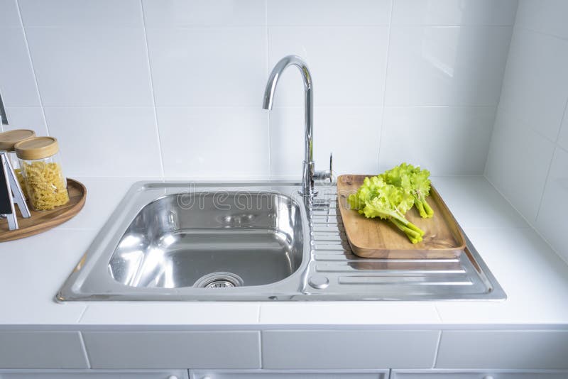 Modern kitchen sink. stock photo. Image of home, furniture - 156281704