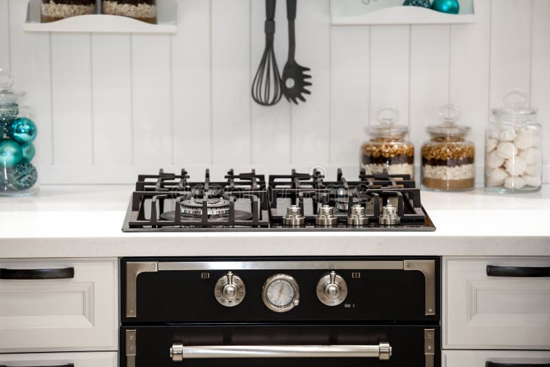 Modern kitchen and stove stock photo. Image of interior - 70550904