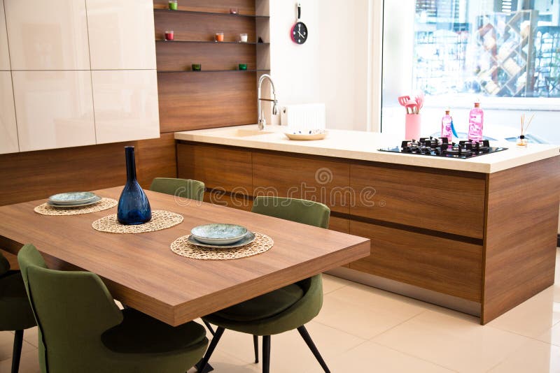 Modern Kitchen, Wooden Walnut Dining Table and Green Chairs Stock Image ...
