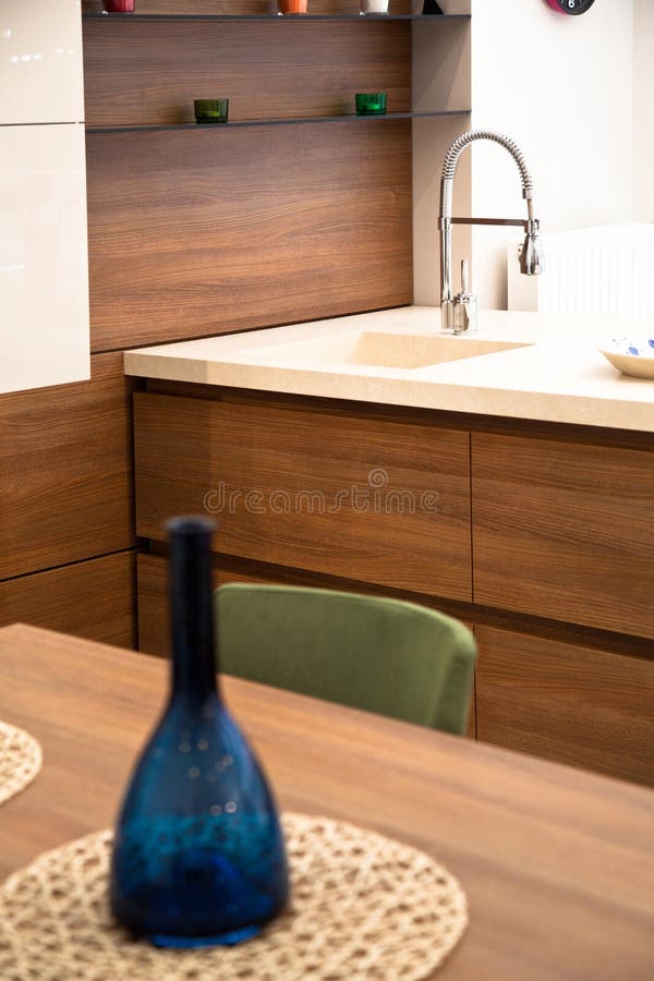 Modern Kitchen, Wooden Walnut Dining Table and Green Chairs Stock Photo ...
