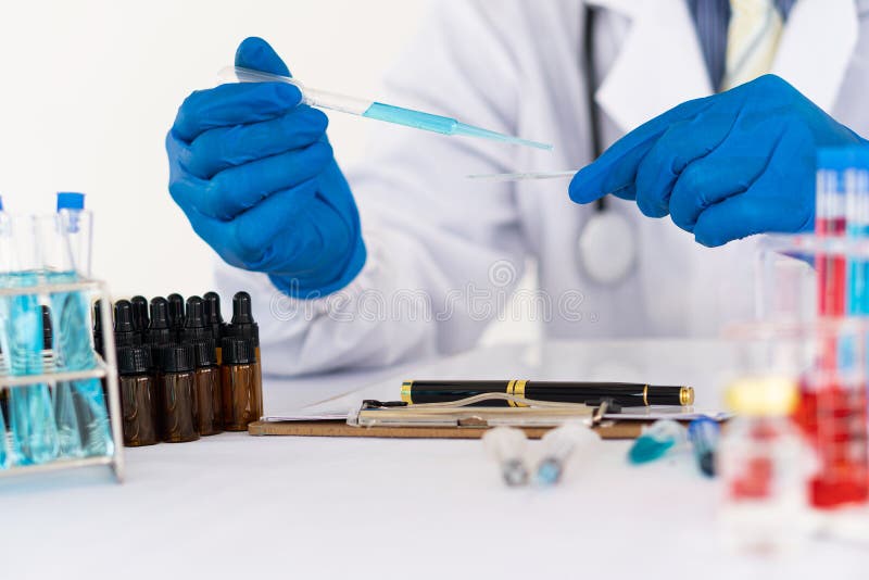 Modern Laboratory Scientists Conduct an Experiment by Synthesizing a ...