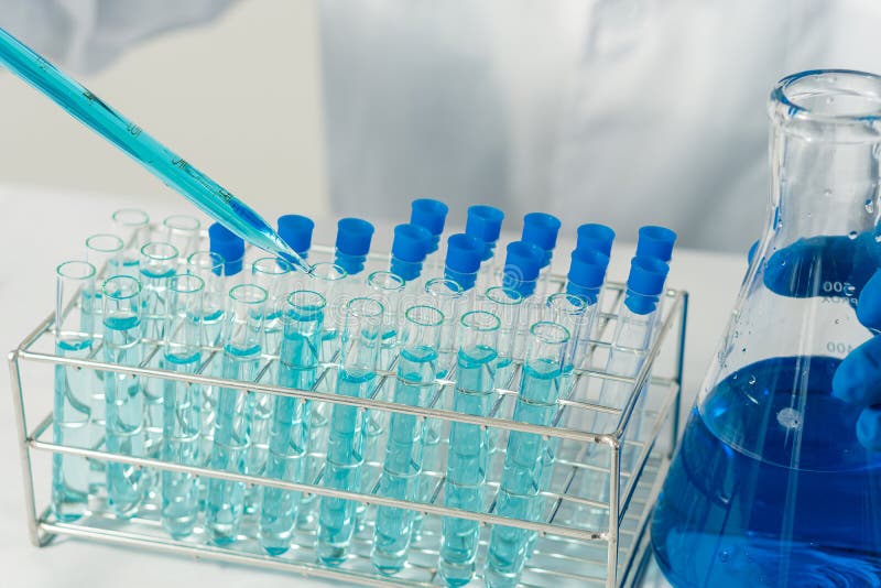 Modern Laboratory Scientists Conduct an Experiment by Synthesizing a ...