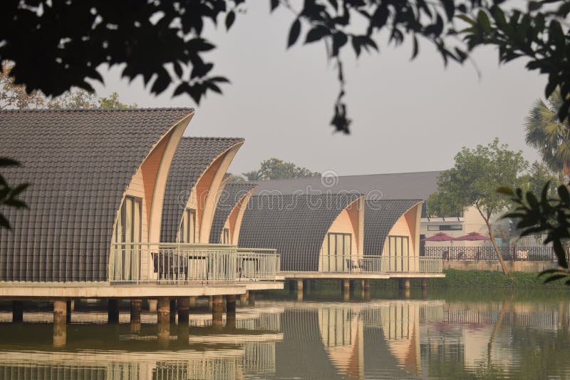 Modern Lakeside Resort Cabins with Curved Roofs Stock Photo - Image of ...