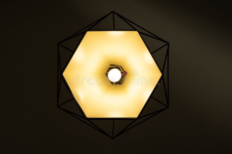 Modern Lamp Hanging Down from Ceiling in the Dark Background Stock ...