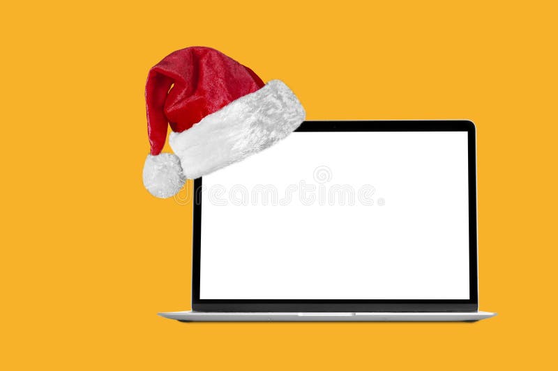 A Modern Laptop Computer with a Santa Claus Hat for Christmas Stock ...