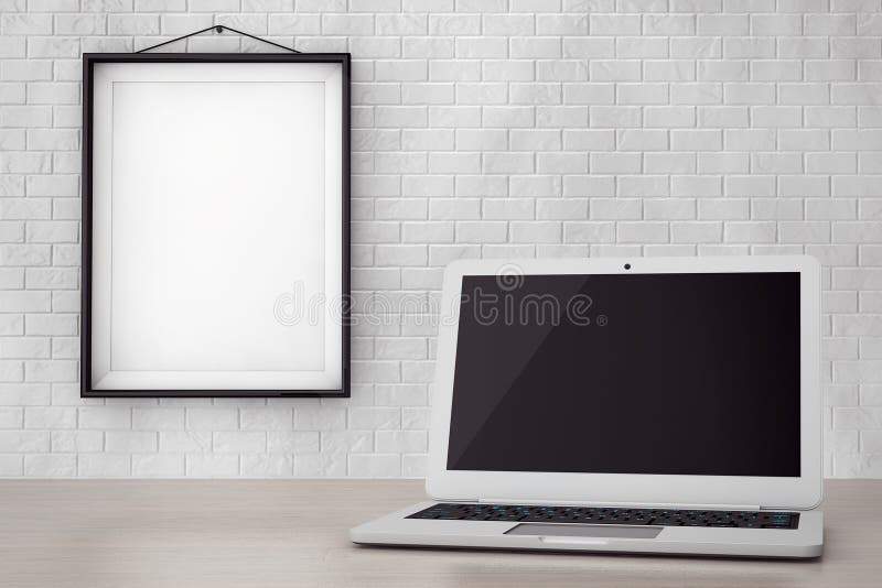 Modern Laptop in Front of Brick Wall with Blank Frame Stock ...