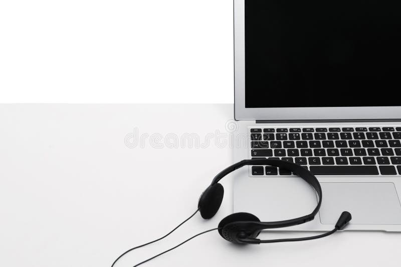 Modern Laptop and Headset on Table, Space for Text Stock Image - Image ...