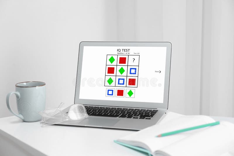 Modern Laptop with IQ Test on Screen in Office Stock Photo - Image of ...