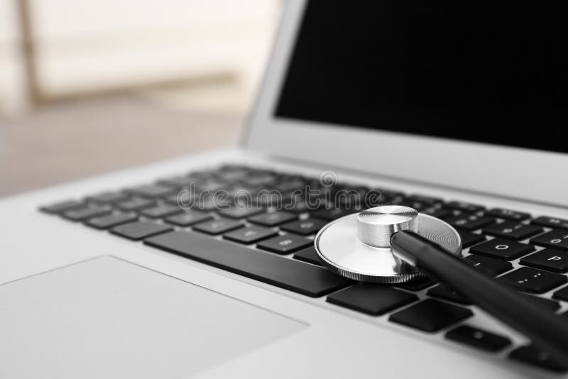Modern Laptop and Stethoscope, Closeup. Stock Image - Image of repair ...